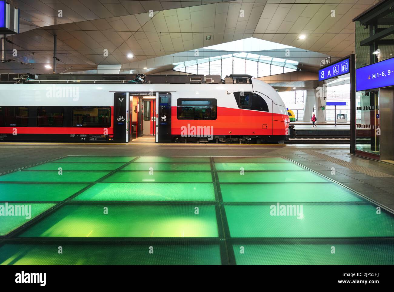 High speed train inside beautiful train station in Vienna, Austria. Red ...