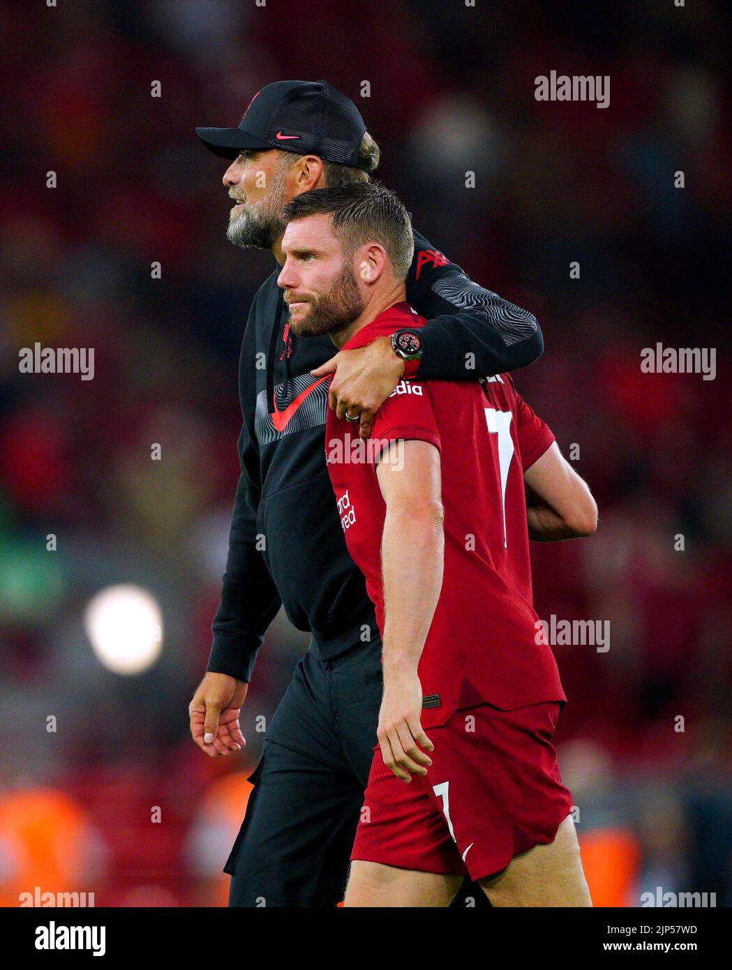 Liverpool manager Jurgen Klopp hugs James Milner at the end of the ...