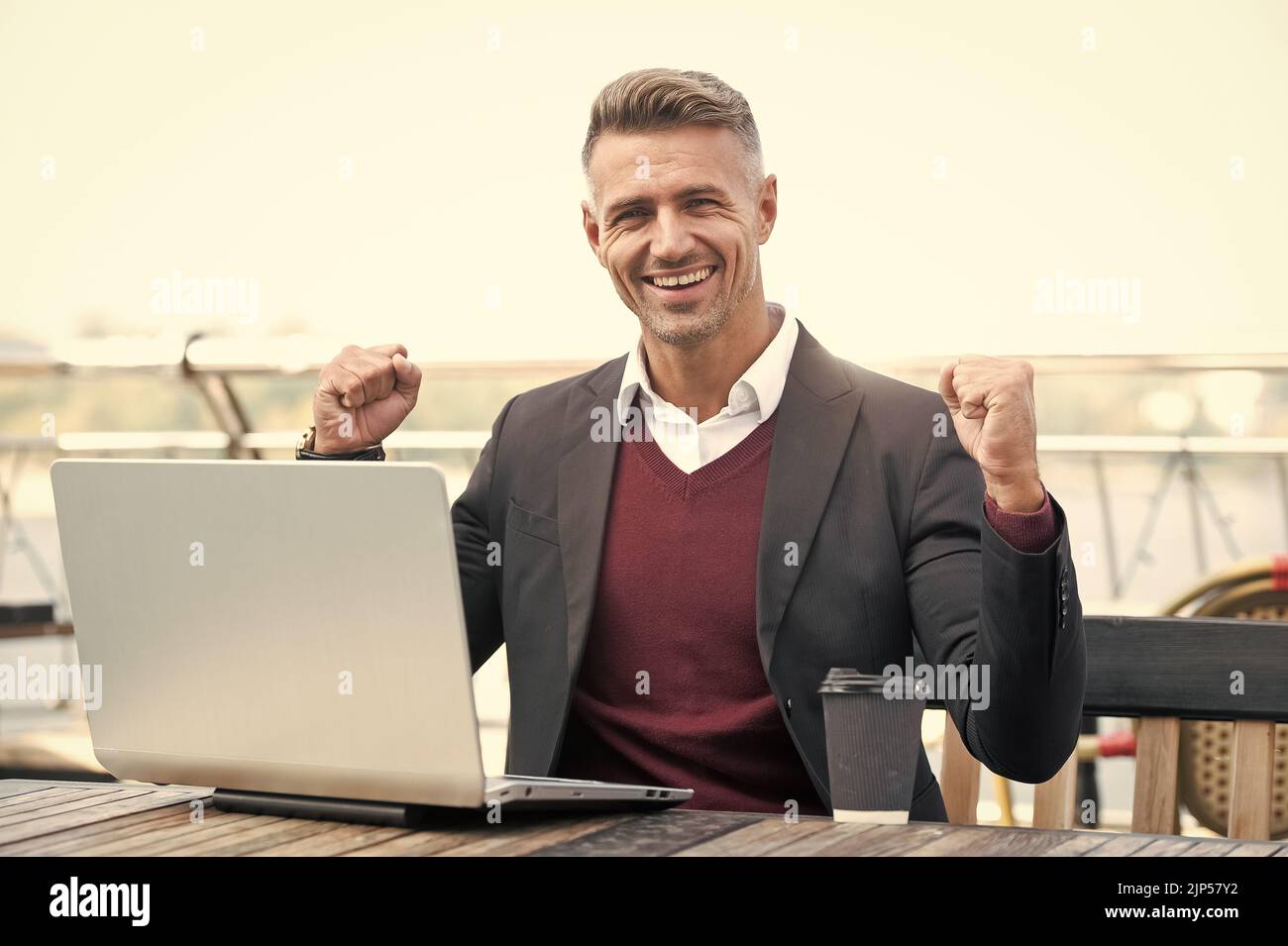 You can win. Happy businessman make winning gesture. Professional man ...