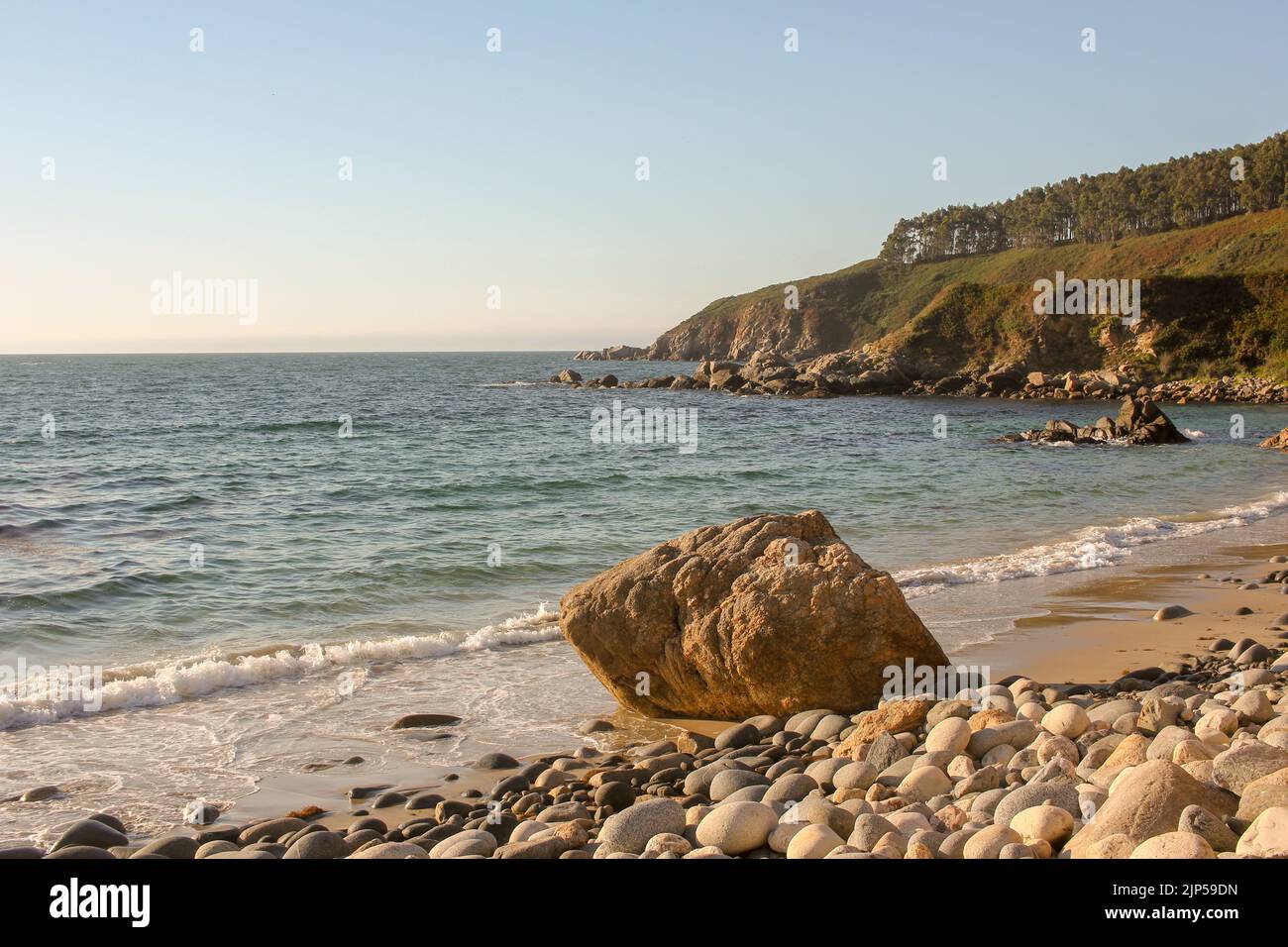 plenty of rocks in this cold beach in the north coast of Spain Stock ...
