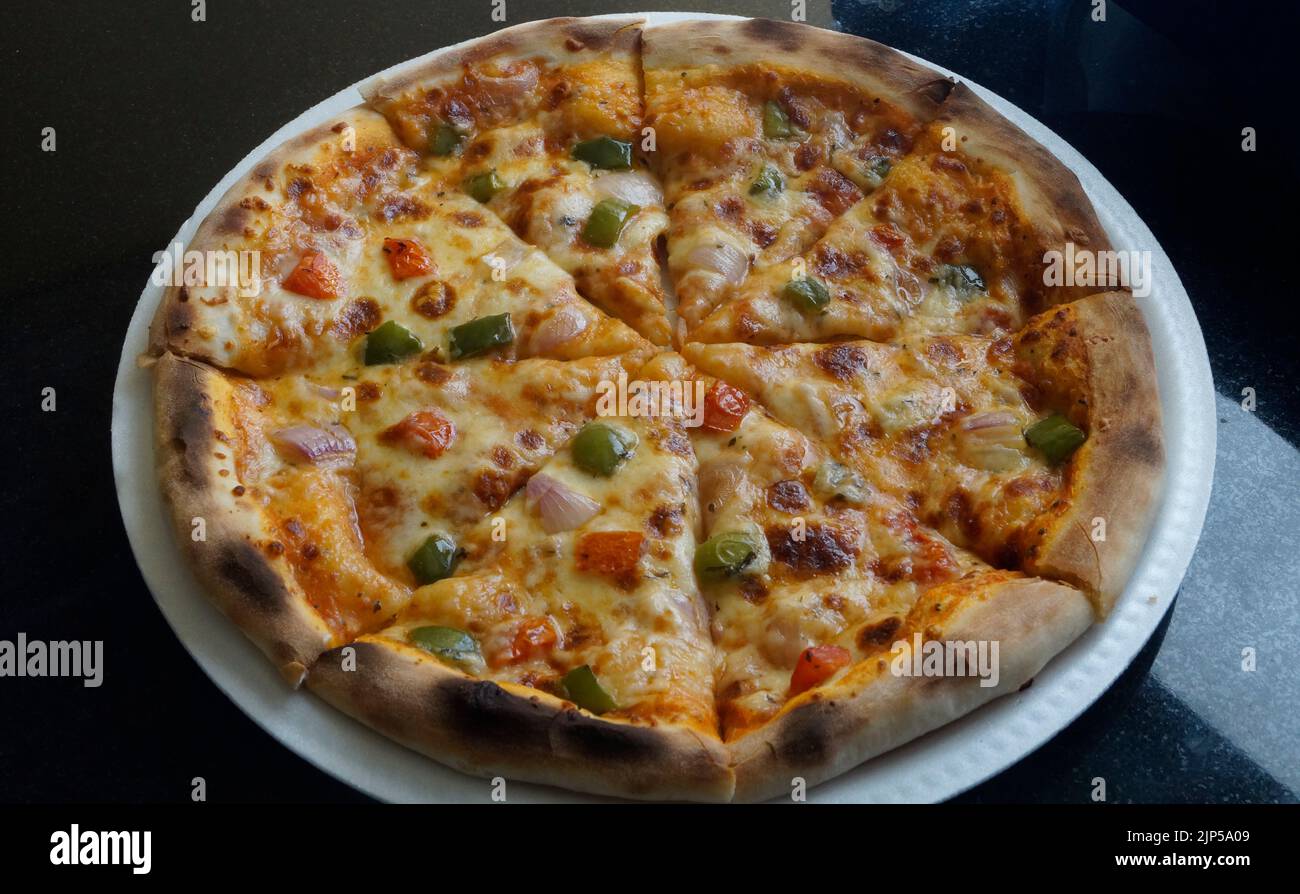 A top view of a double cheese pizza Stock Photo - Alamy