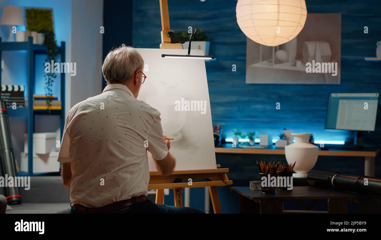 Retired person drawing inspiration design to create artwork masterpiece ...