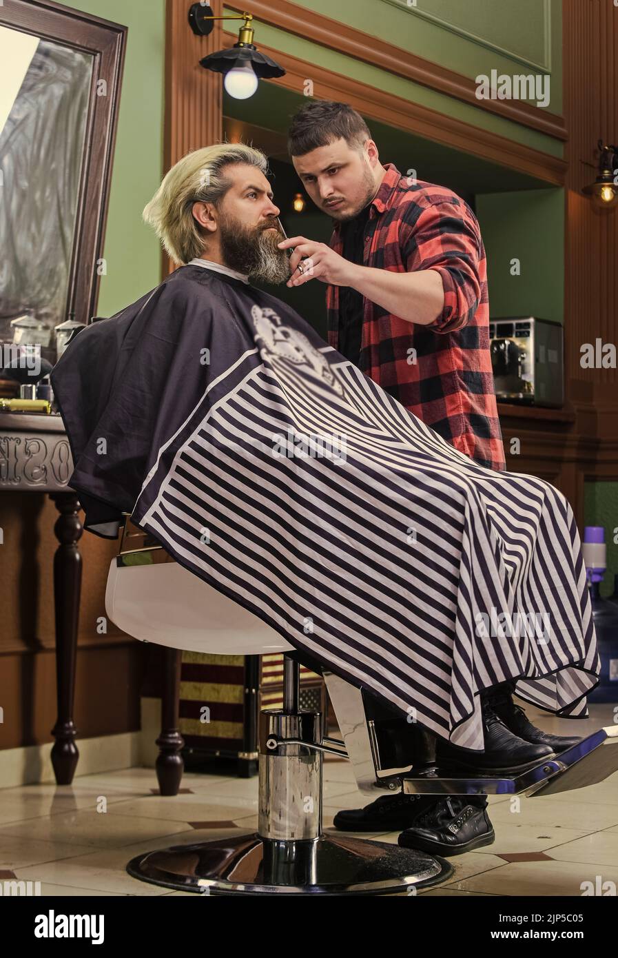 Professional stylist. male barber care. barbershop. brutal bearded man ...