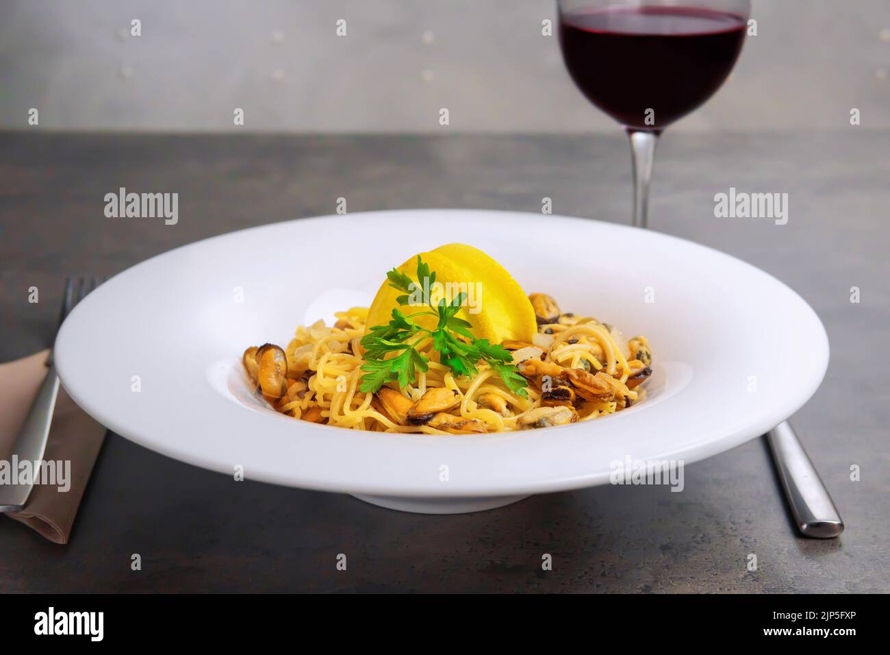 Italian Spaghetti Cozza Nera style With Red Wine Stock Photo - Alamy