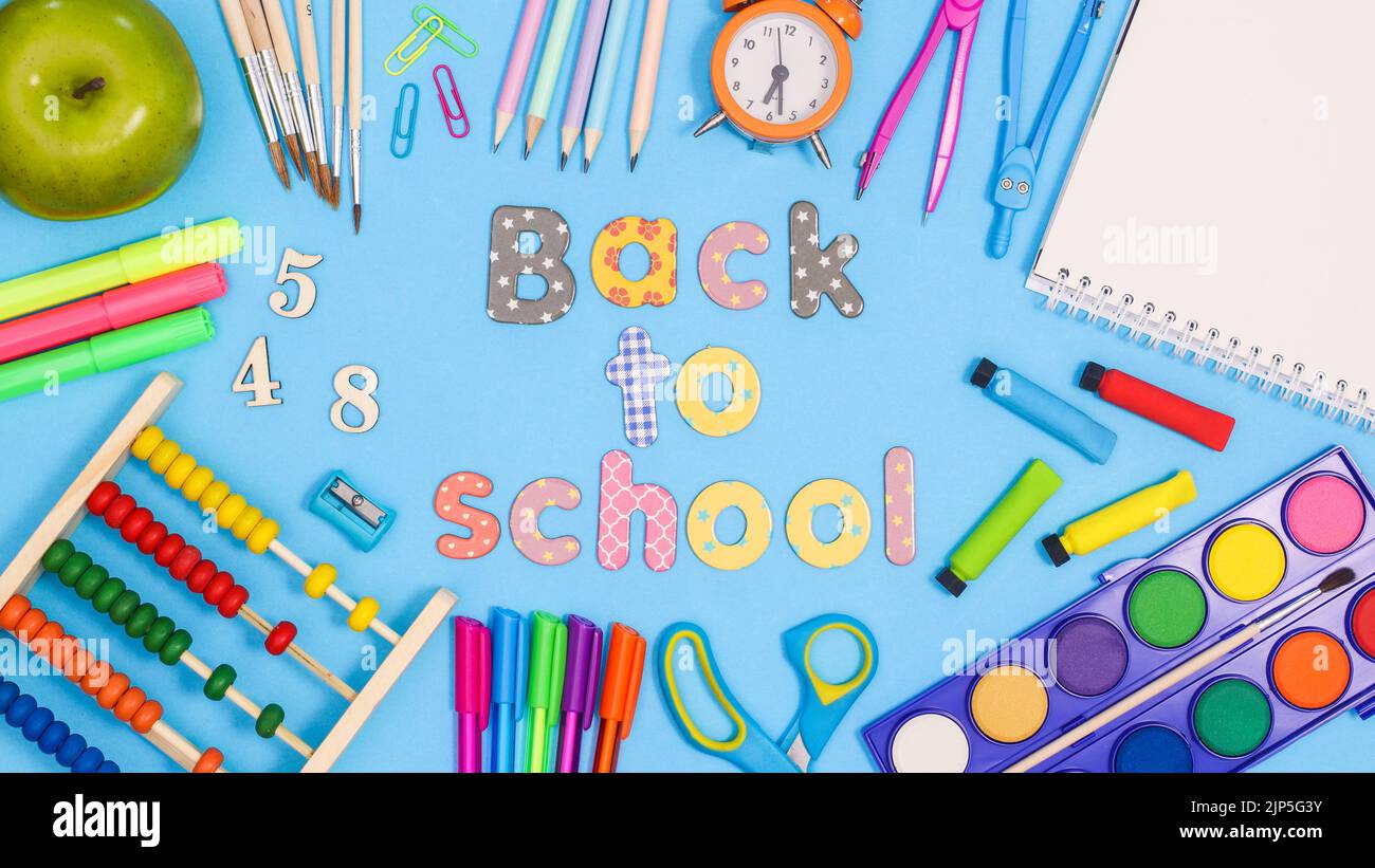 Back to school background with text and school stationery around. Flat ...