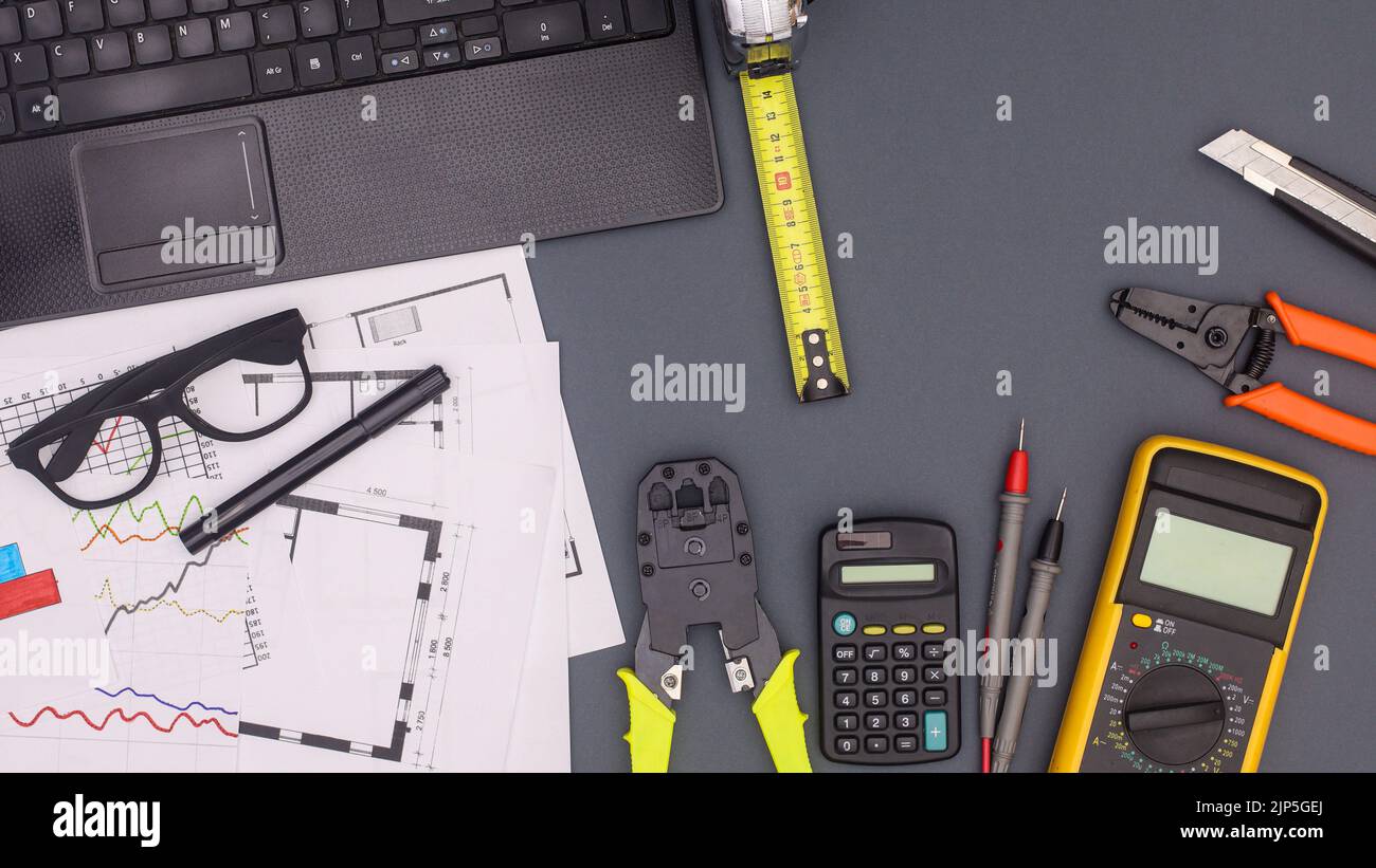Business and architecture table with plans and construction tools. Flat ...