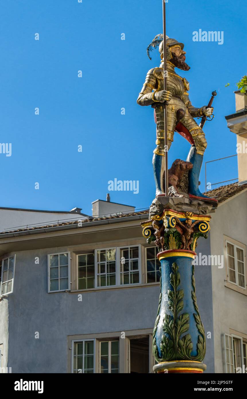 The fountain on the Stussihofstatt in the historic center of Zurich ...
