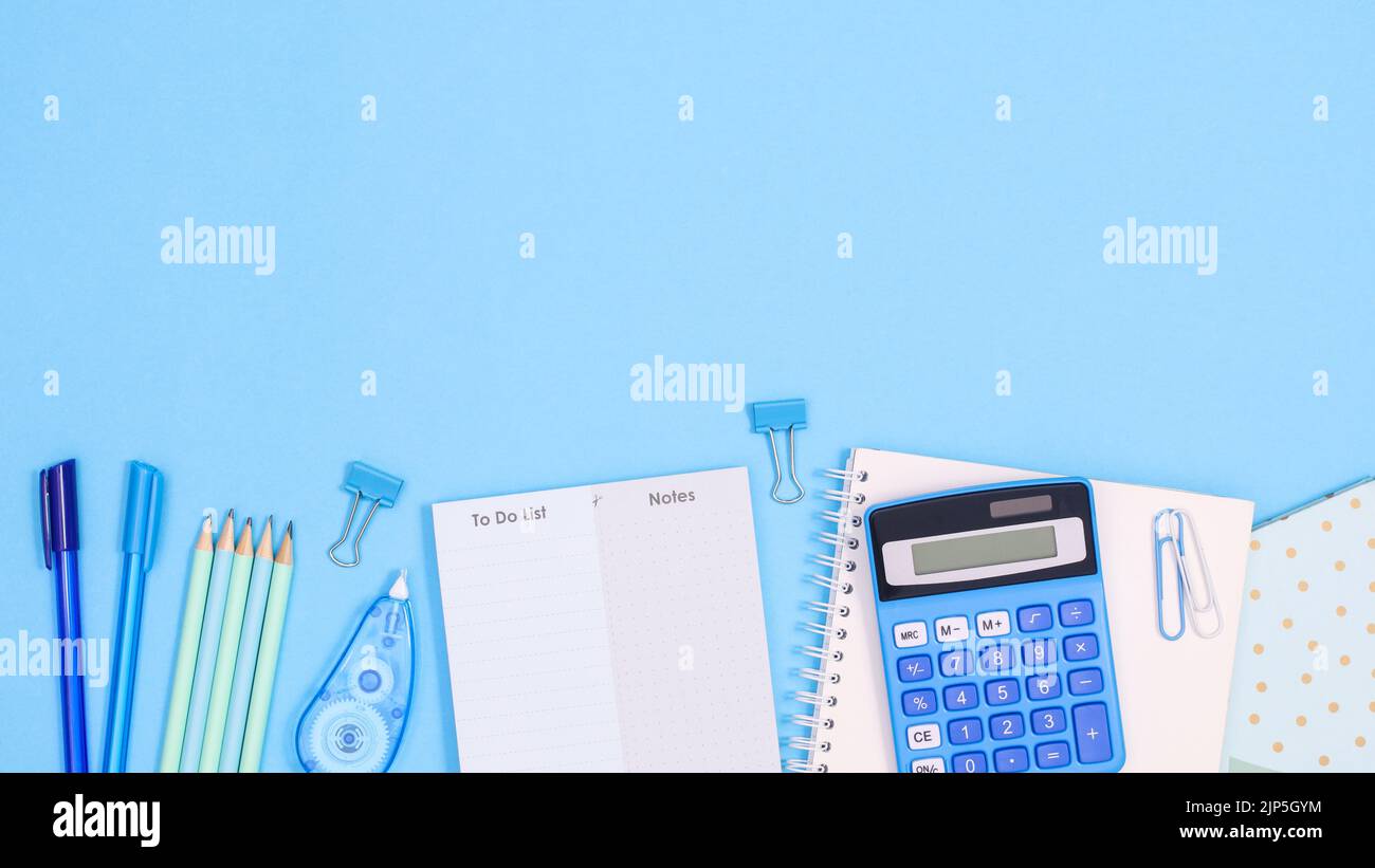 Back to school copy space background with school statioenry on pastel ...