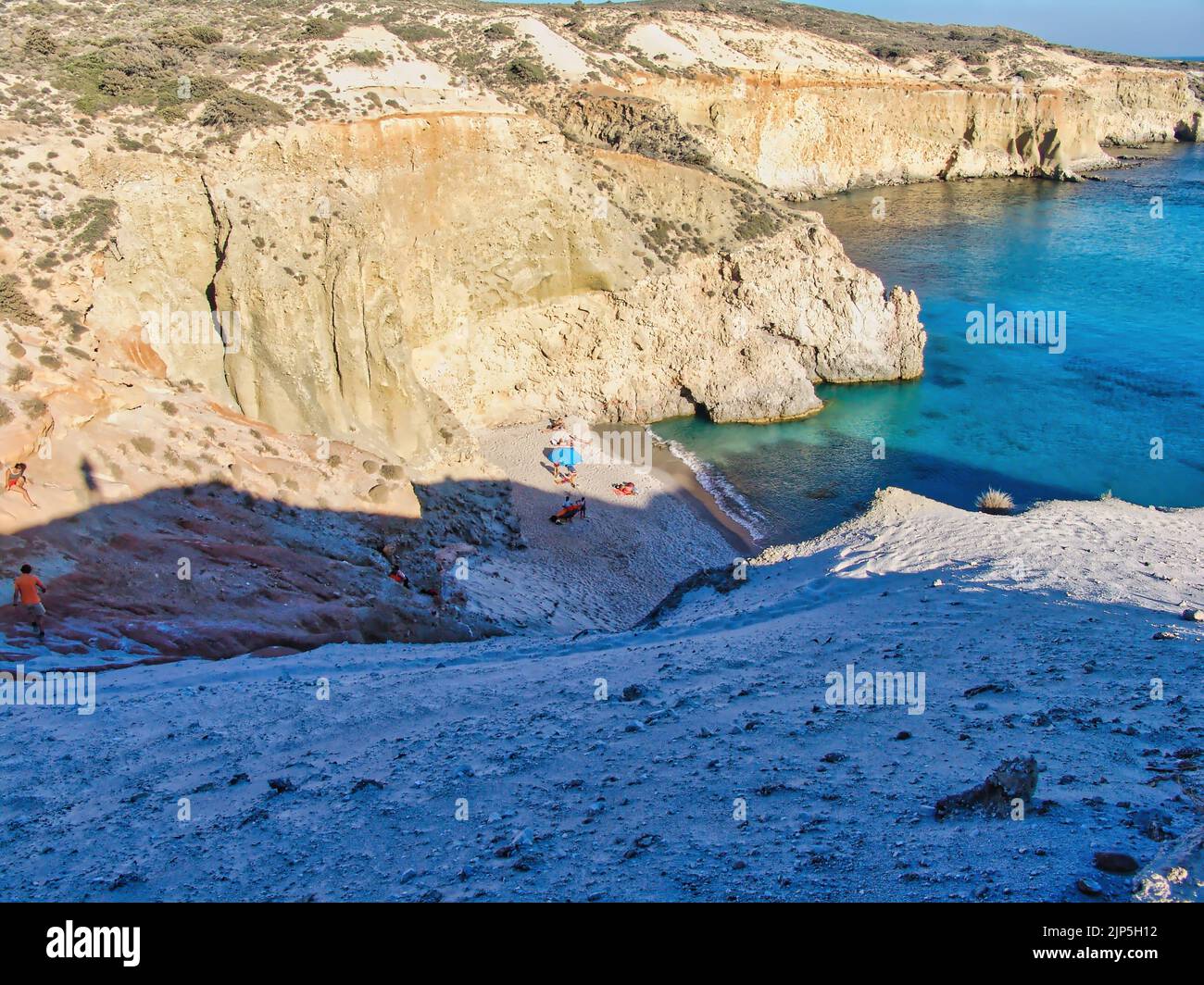 A mesmerizing view of sunny Tsigrado Beach in Milos Island, Greece ...