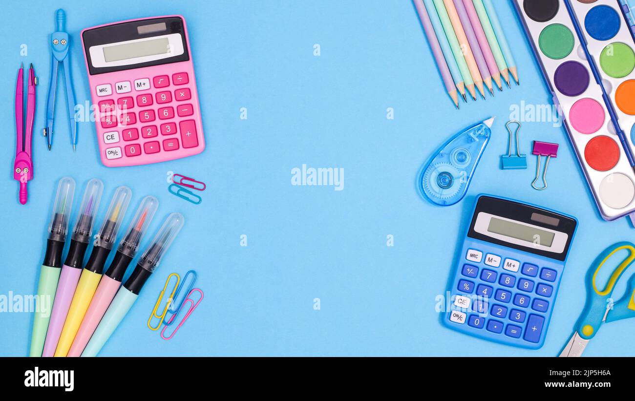 Back to school copy space backgroundwith school stationery on pastel ...
