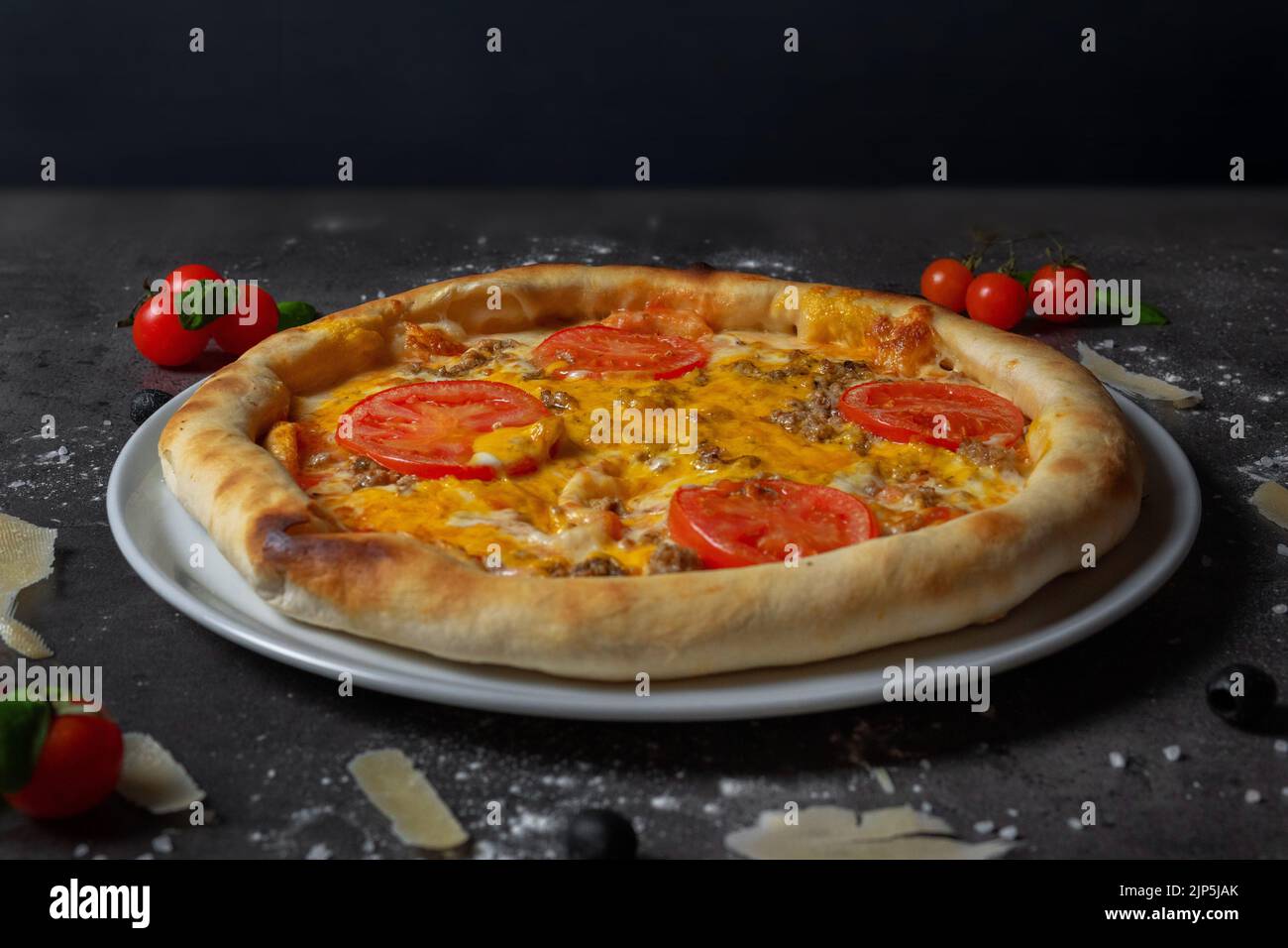 Italian Style Pizza With Tomato and Cheddar Cheese Stock Photo - Alamy