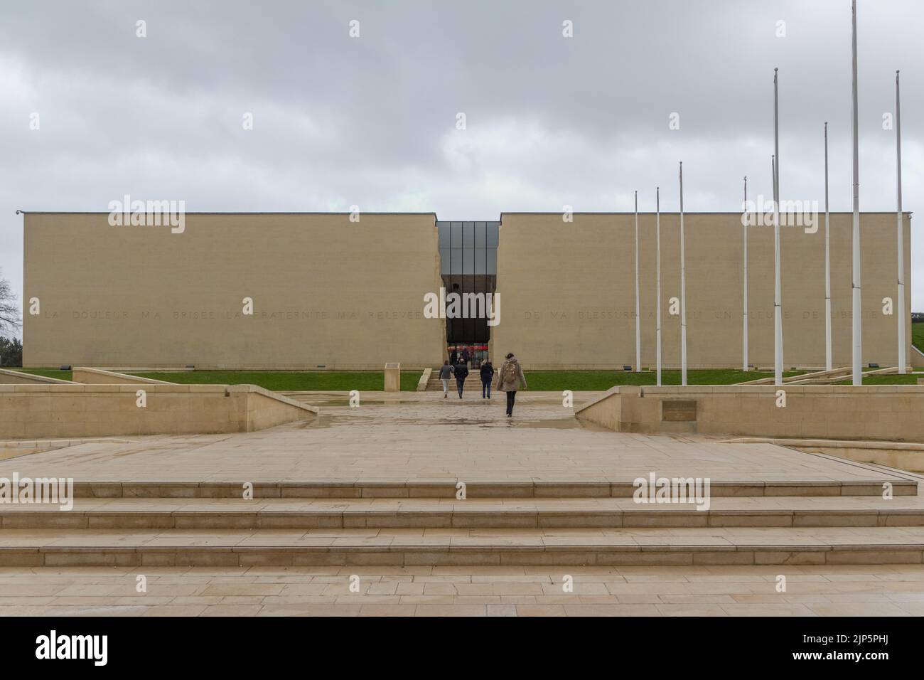 The famous Memorial de Caen museum in France with a cloudy sky in the ...