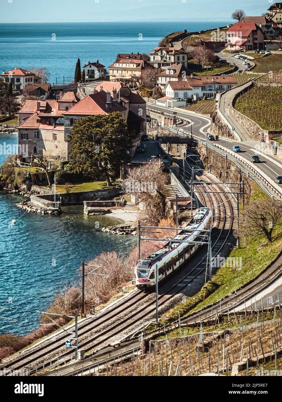 A vertical shot from the Lavaux Vineyards to the coastline buildings ...