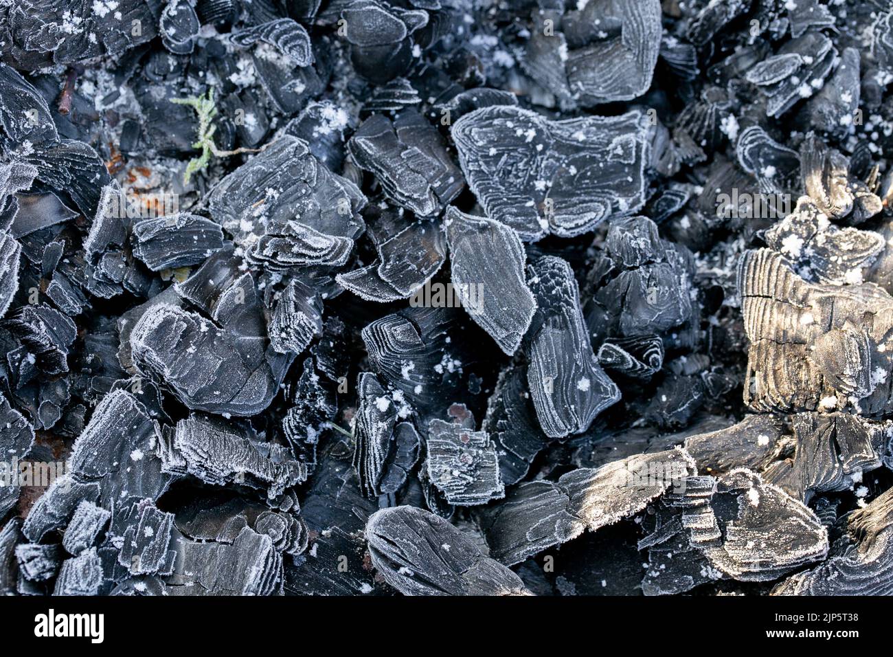 Charcoal in frost background. Frozen coal texture.Heating season.First ...