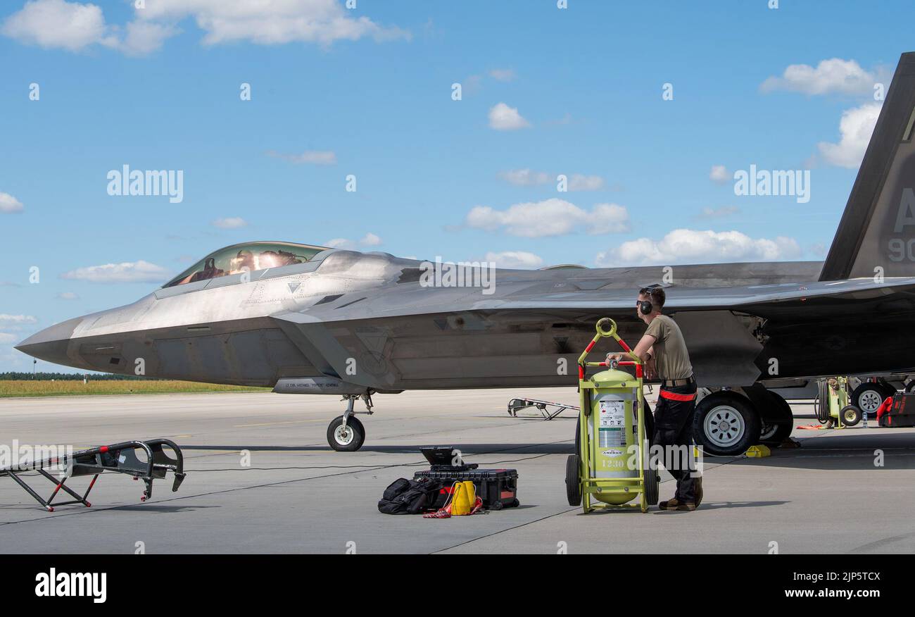 A U.S. Air Force maintainer from the 90th Expeditionary Fighter ...