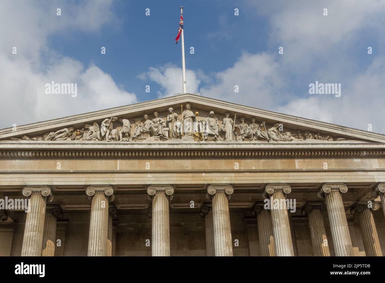 A low angle view of the entrance pillars to the British Museum in the ...