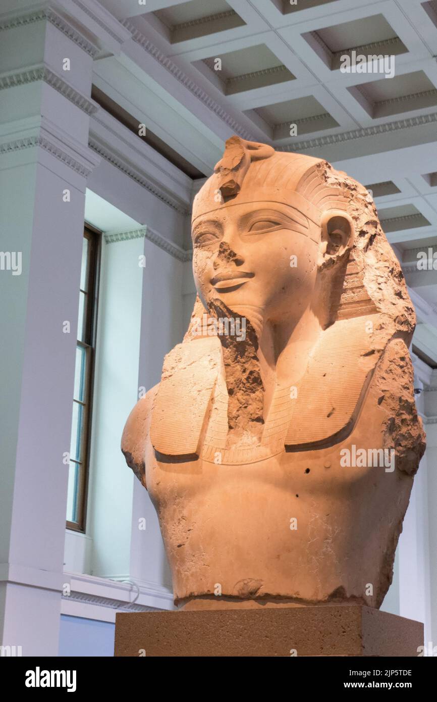 A vertical shot of a granite statue at the British Museum in the UK ...