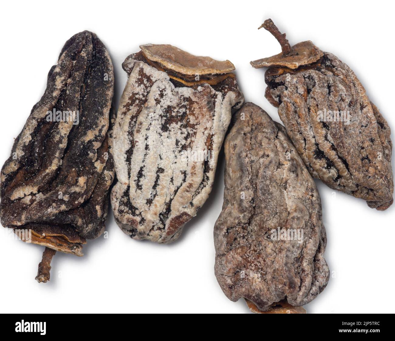 Dried persimmon on a white background. Dried fruits of the tree. Dried ...
