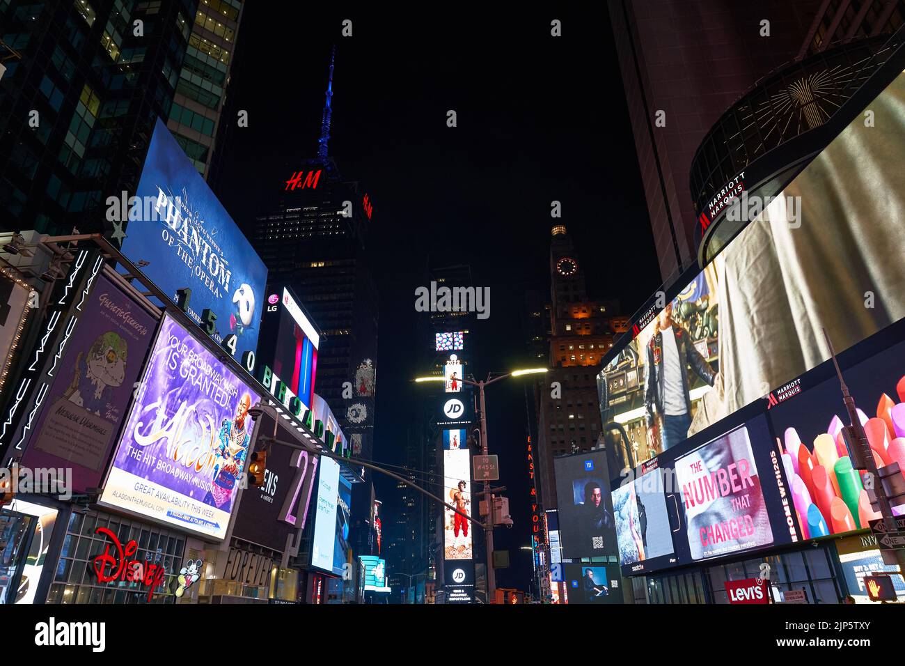 A beautiful night view of the Times Square with skyscrapers in the ...