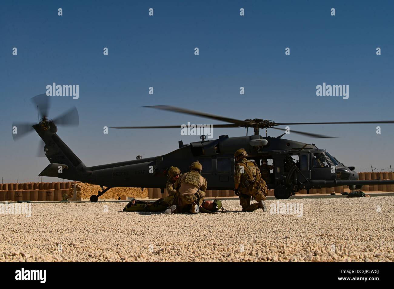 U.S. Air Force pararescuemen, assigned to the 52nd Expeditionary Rescue ...