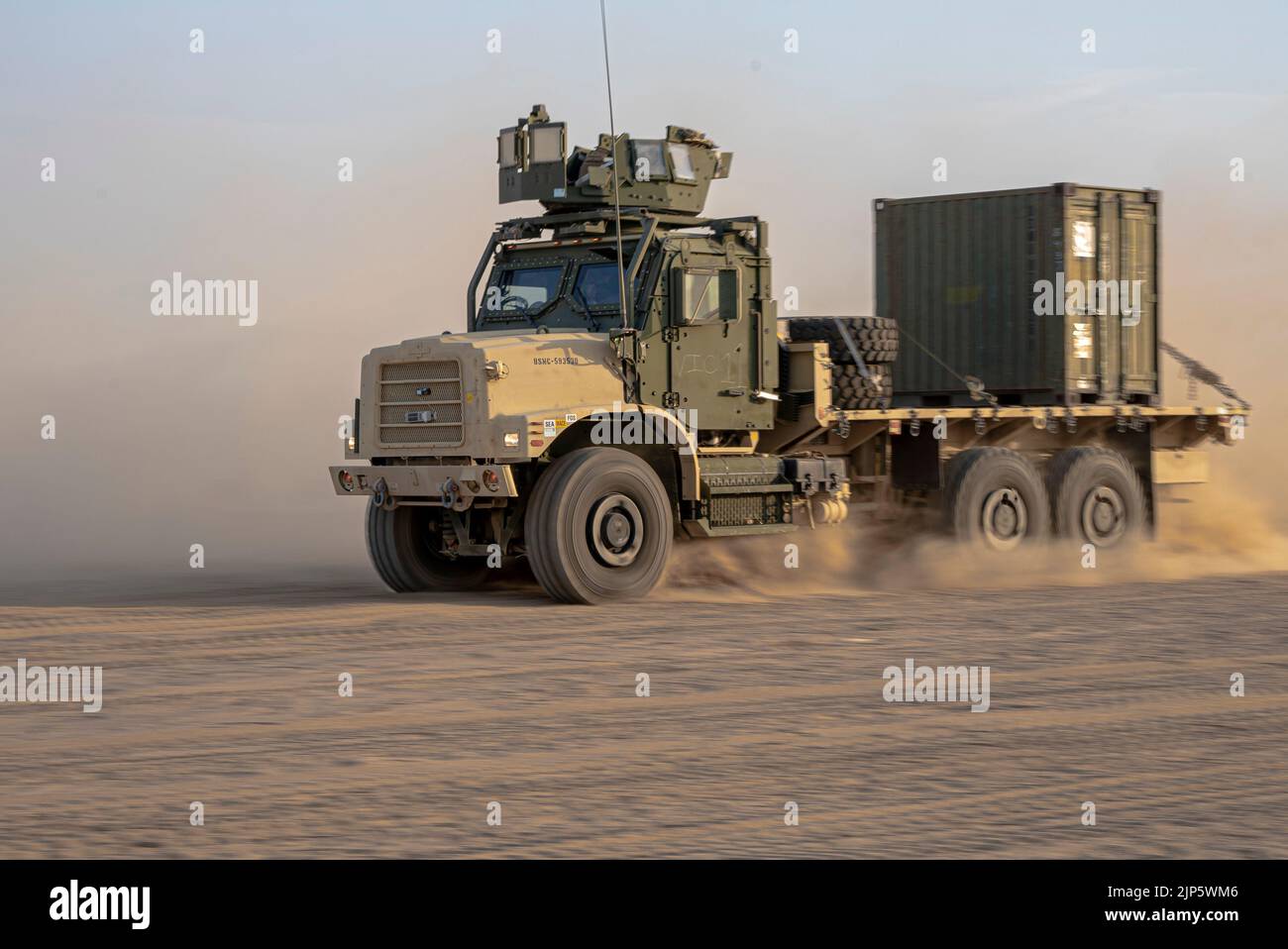 A U.S. Marine Corps AMK23 cargo truck moves with a convoy inside a ...