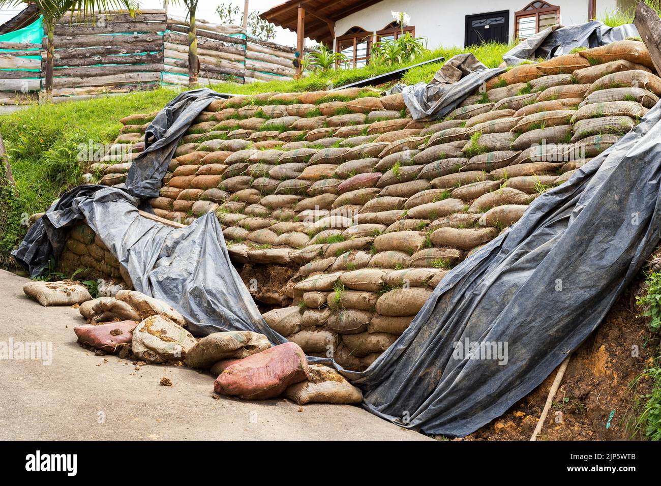 Retaining wall with sacks full of earth Stock Photo - Alamy