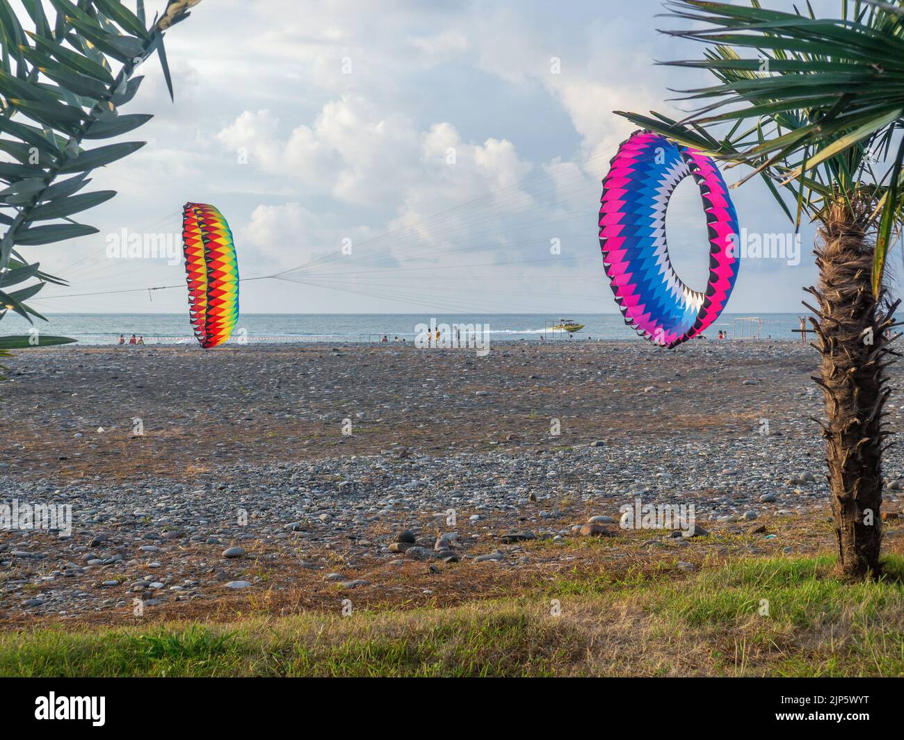 Parachutes on the ground. Wind. Kite Festival. People fly kites ...