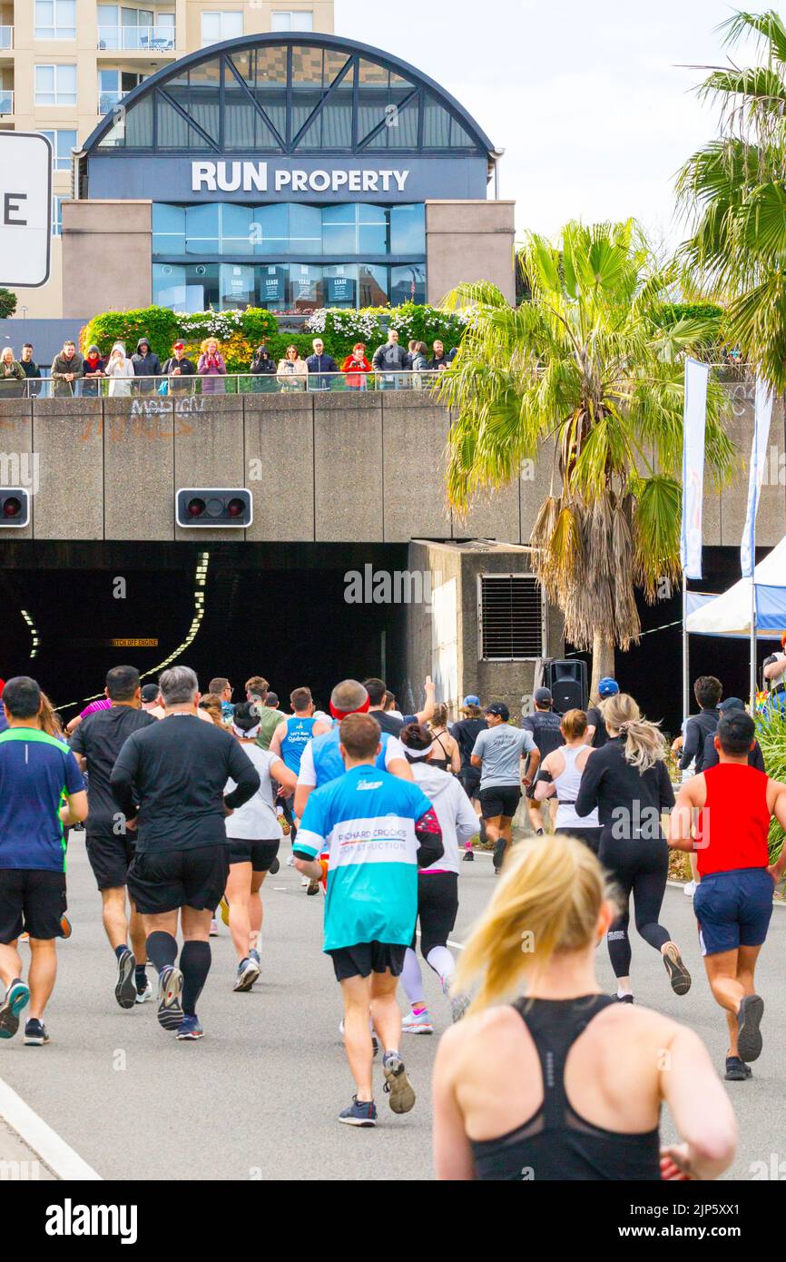 Runners on William Street during the 2022 'City 2 Surf' marathon. The ...