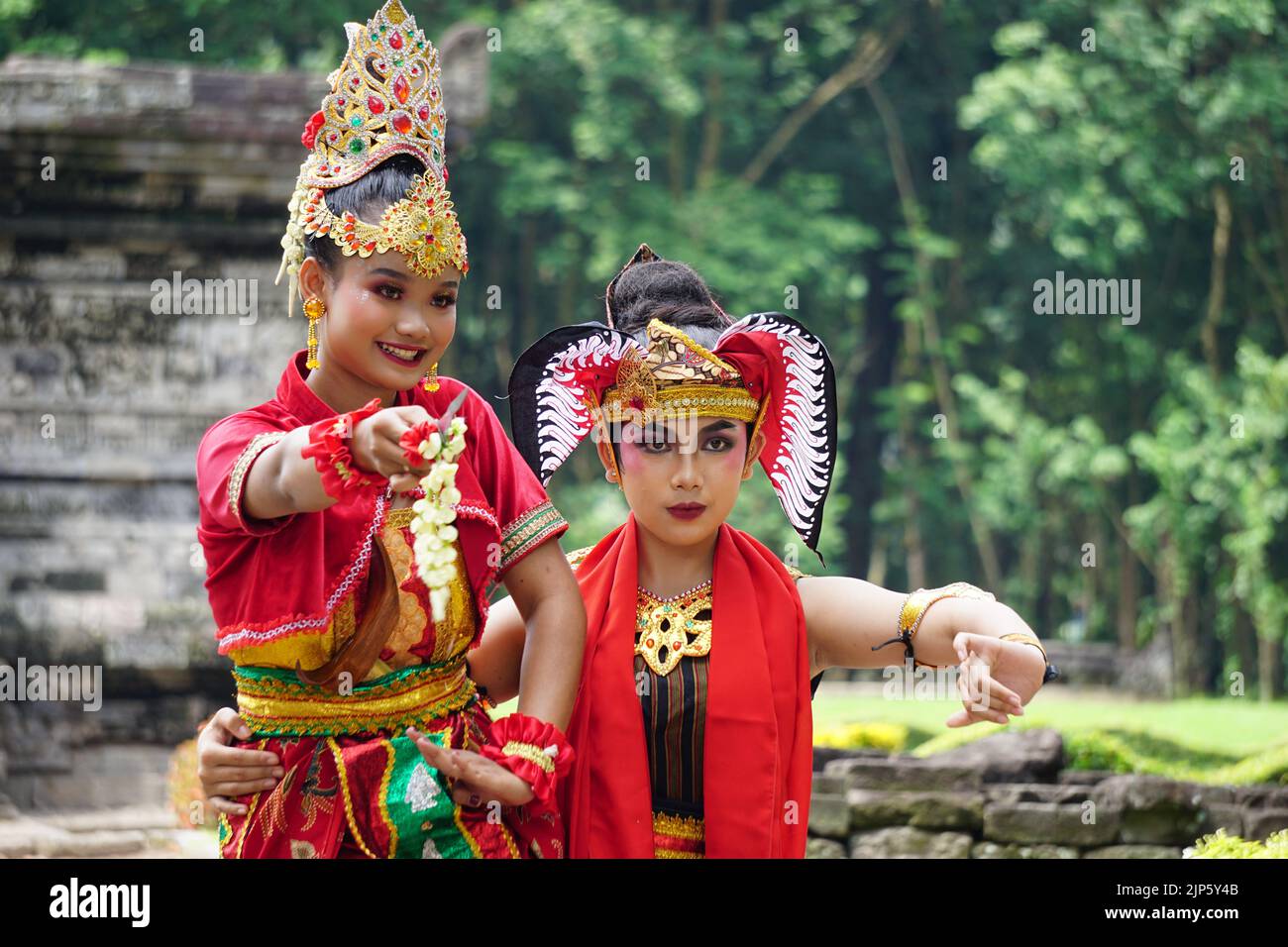Indonesian dancer with the traditional costume is ready to perform to ...