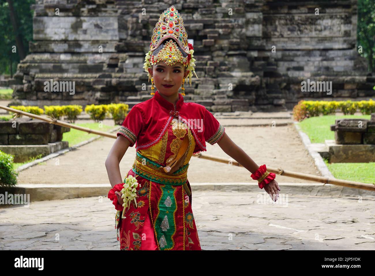 Indonesian dancer with the traditional costume is ready to perform to ...