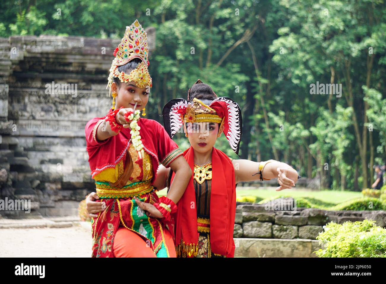 Indonesian dancer with the traditional costume is ready to perform to ...