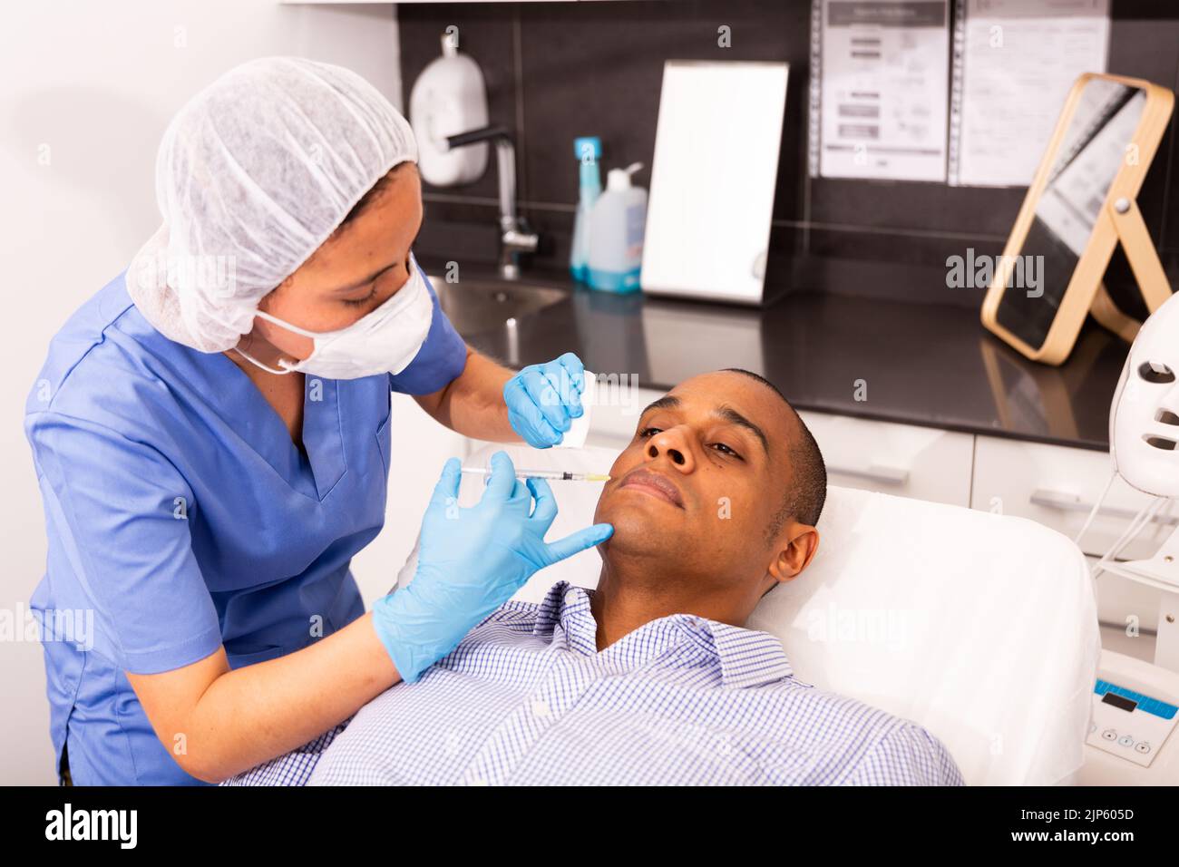Female getting injections hyaluronic hi-res stock photography and ...