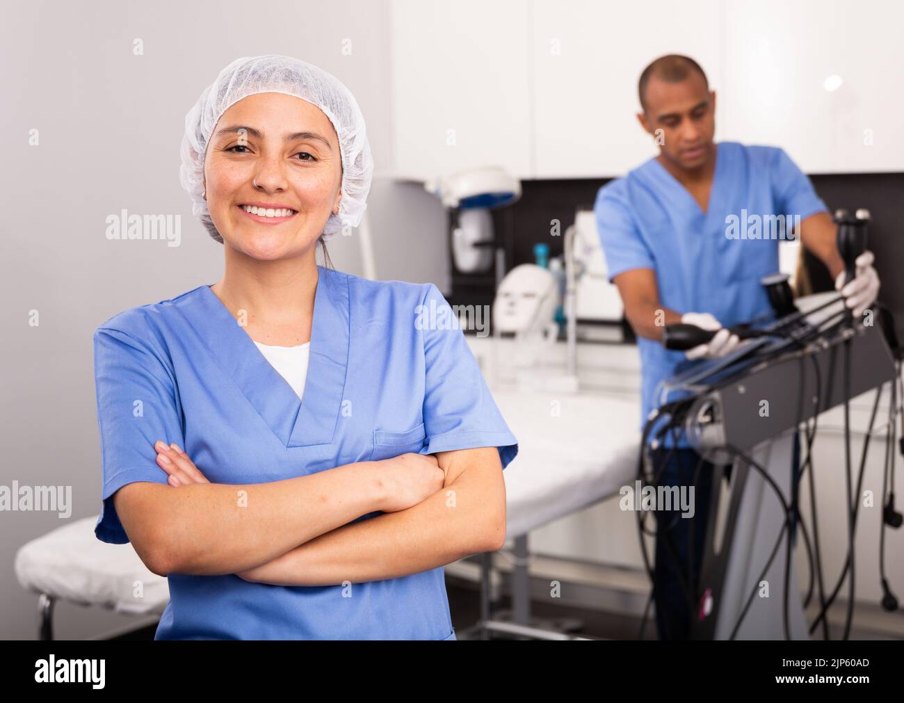 Smiling female cosmetologist in clinic of aesthetic medicine Stock ...