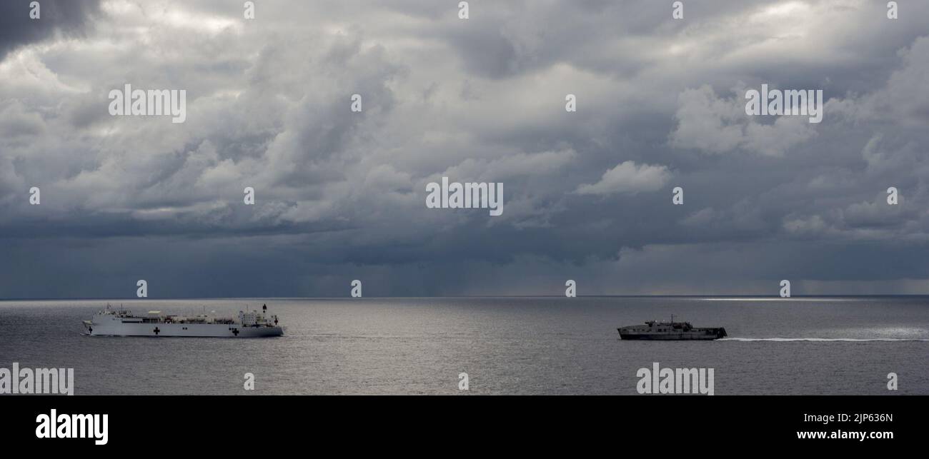 The Military Sealift Command hospital ship USNS Mercy (T-AH 19) and ...