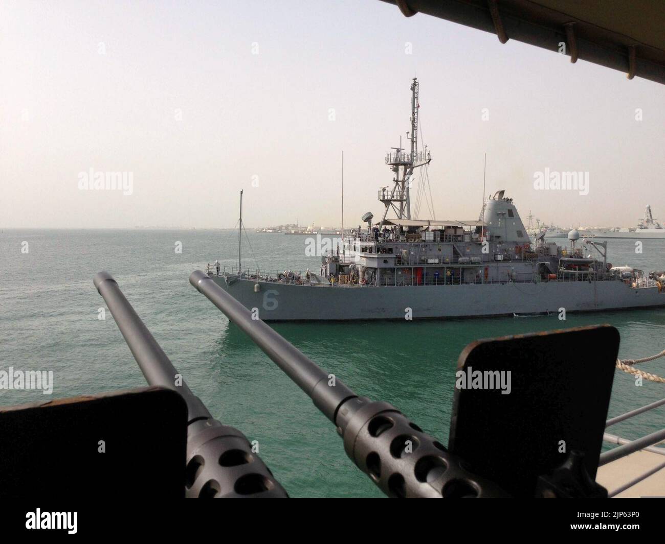 The mine countermeasures ship USS Devastator (MCM 6) departs Mina ...
