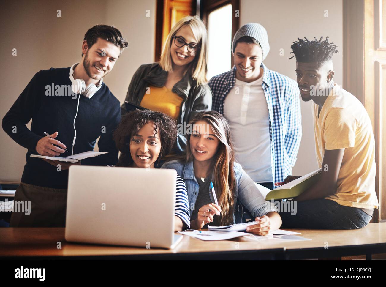Planning our class project together. a group of university students ...