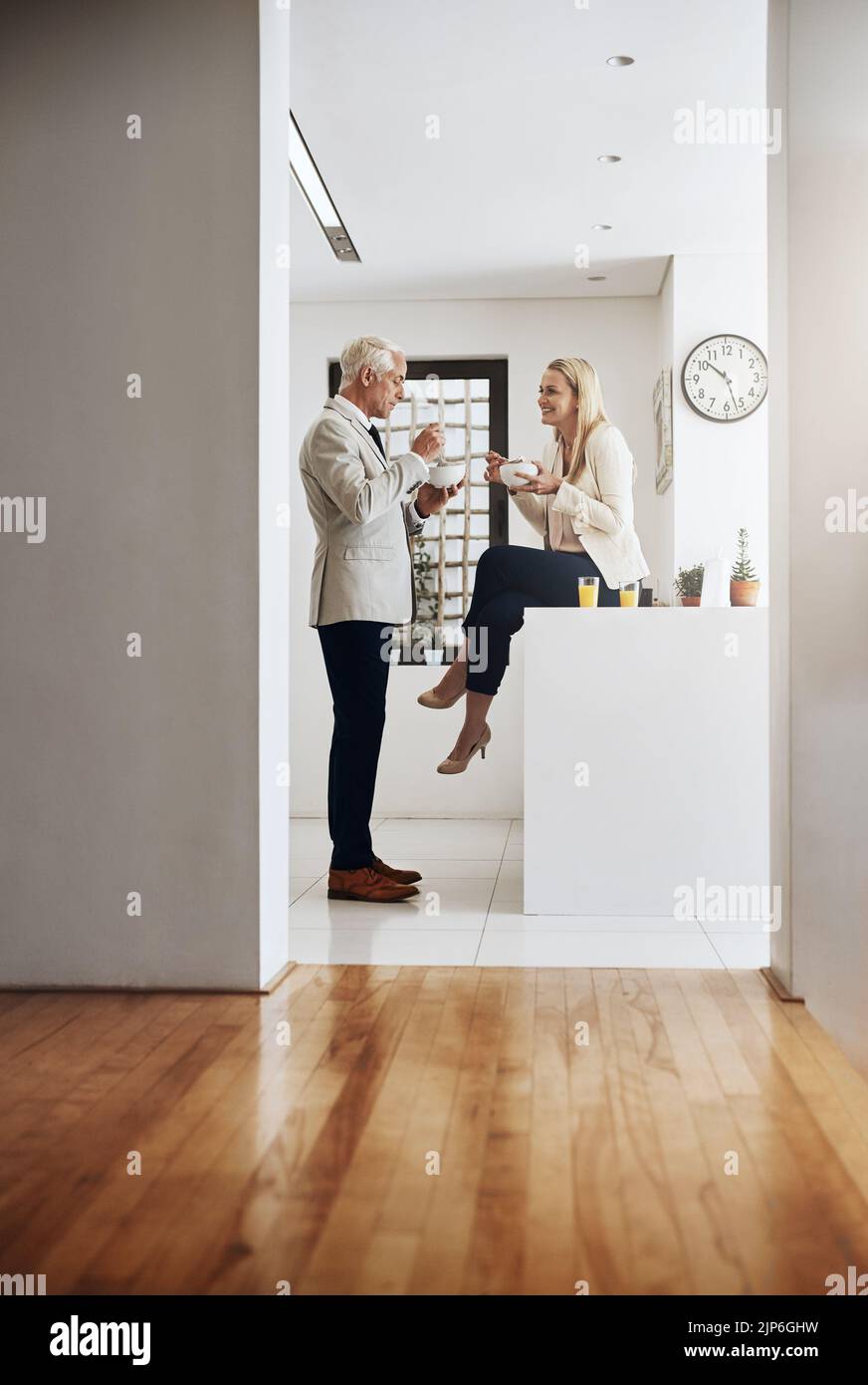 Couples breakfast routine. a cheerful mature couple eating breakfast ...
