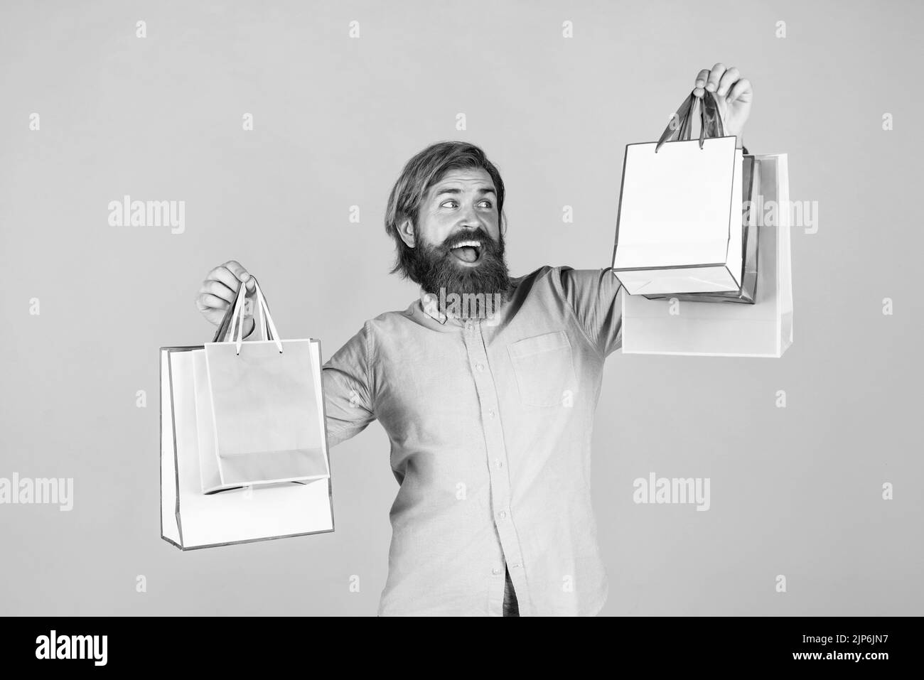 Man moustache hold xmas Black and White Stock Photos & Images - Alamy