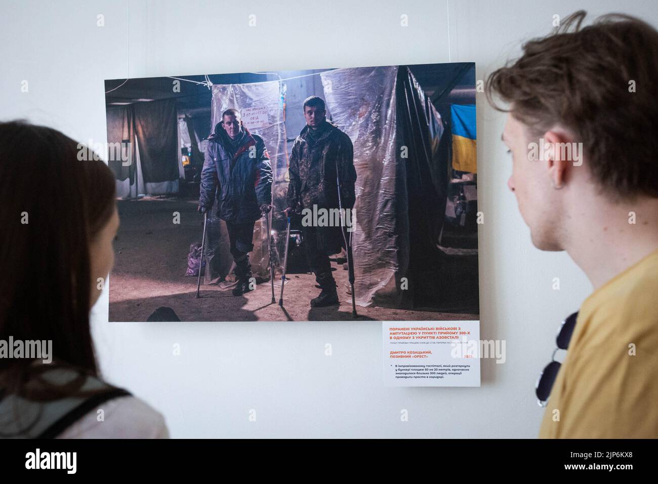 People watch pictures by Azov soldier-photographer Dmytro 'Orest ...