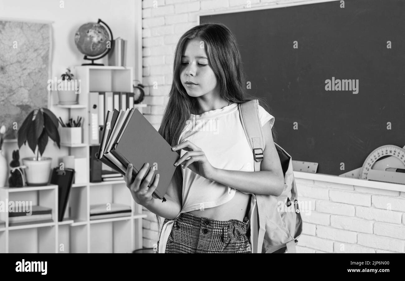 ready to work. back to school. teen girl work in classroom near ...