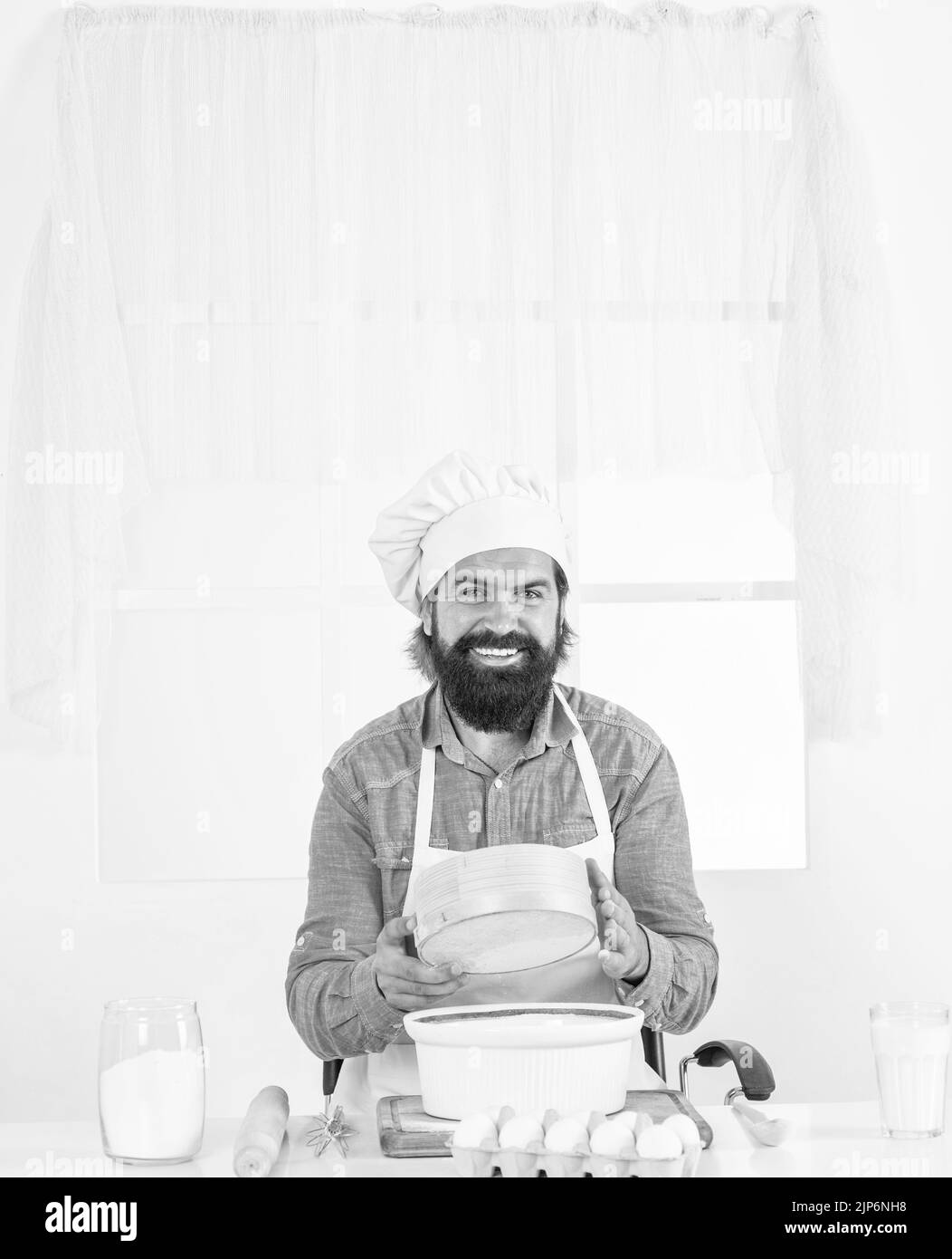 Male chef in apron using Black and White Stock Photos & Images - Alamy