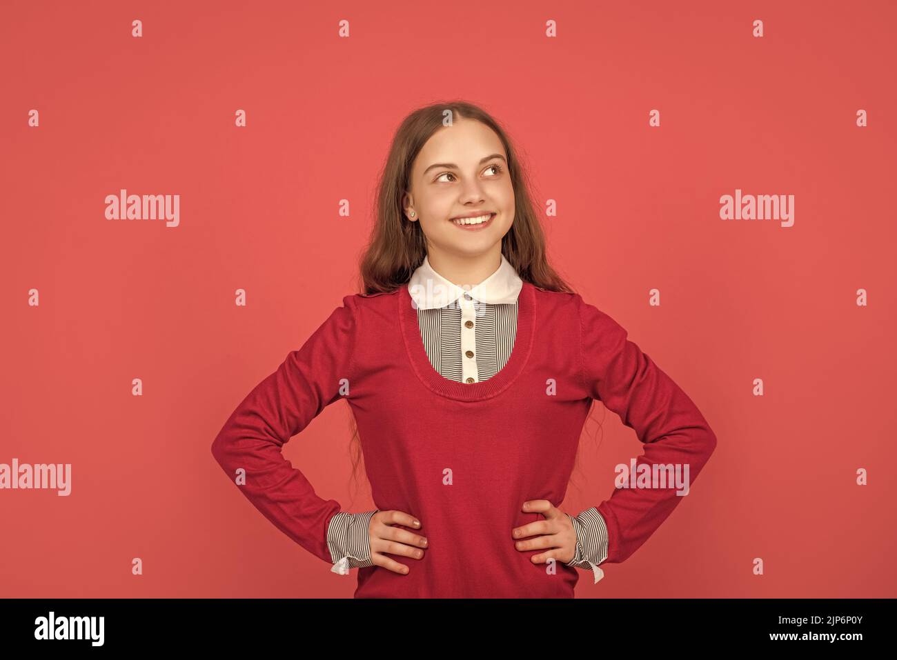 happy child in school uniform on red background, childhood Stock Photo ...