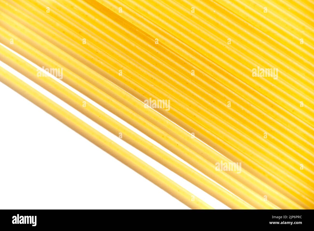 Italian food concept, macro image of raw long pasta, spaghetti, on ...