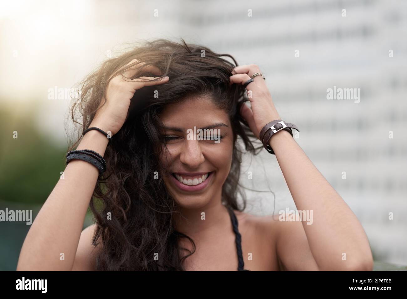 Her beauty radiates throughout the city. an attractive young woman out ...