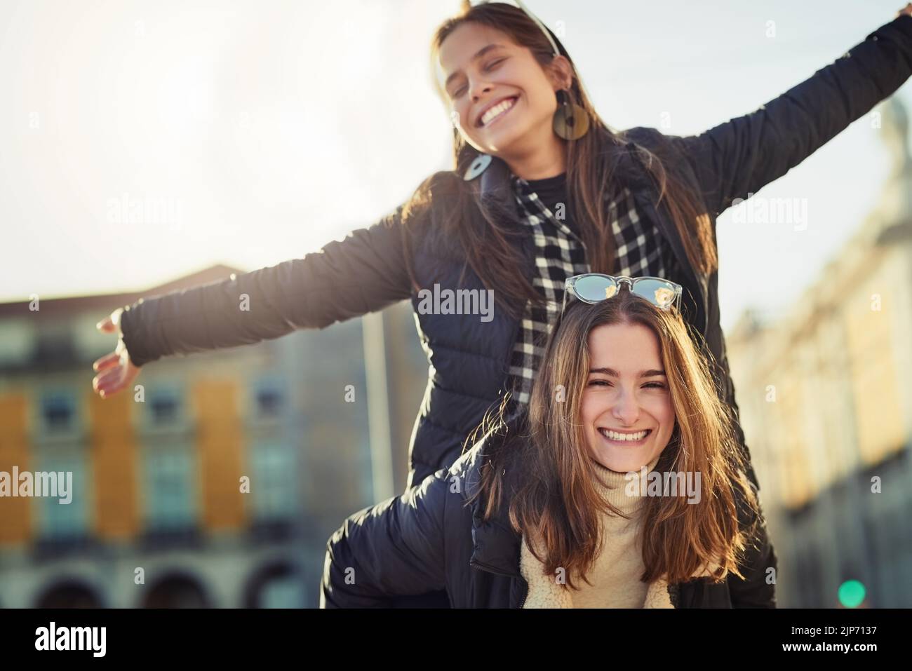 We always have fun together. Cropped portrait of two attractive young ...
