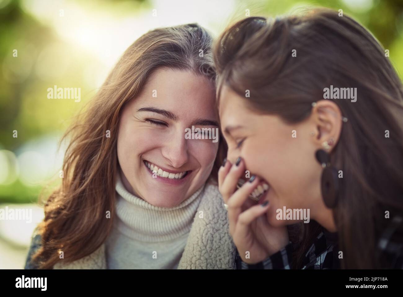 Its all fun and games when theyre together. two attractive young women ...