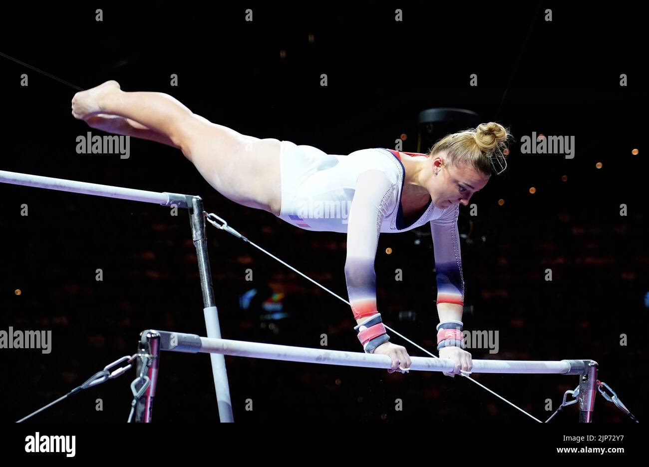 Lorette Charpy Fra Performing Her Routine On The Womens Uneven Bars