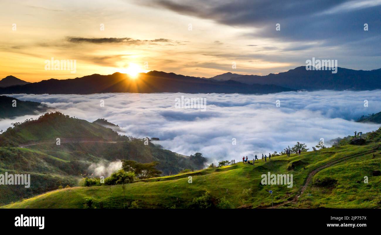 Tourists are excited to watch the sunrise and the valley filled with ...
