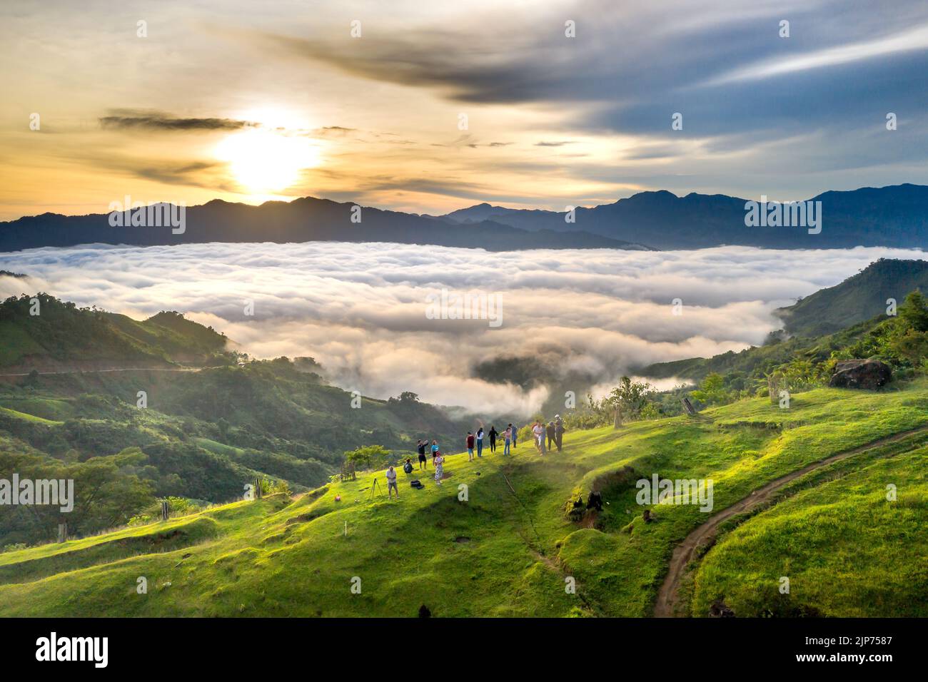 Tourists are excited to watch the sunrise and the valley filled with ...