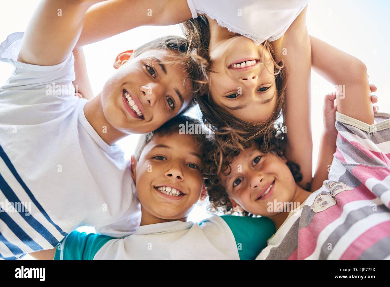 No other support like the support from a sibling. Low angle portrait of ...